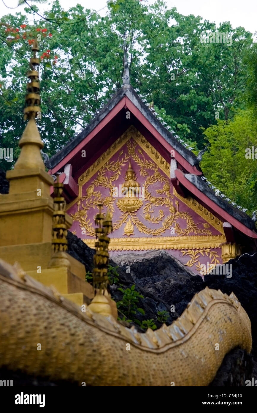 An ornate and detailed Buddhist pagoda decorates Wat Phu Si Temple in ...
