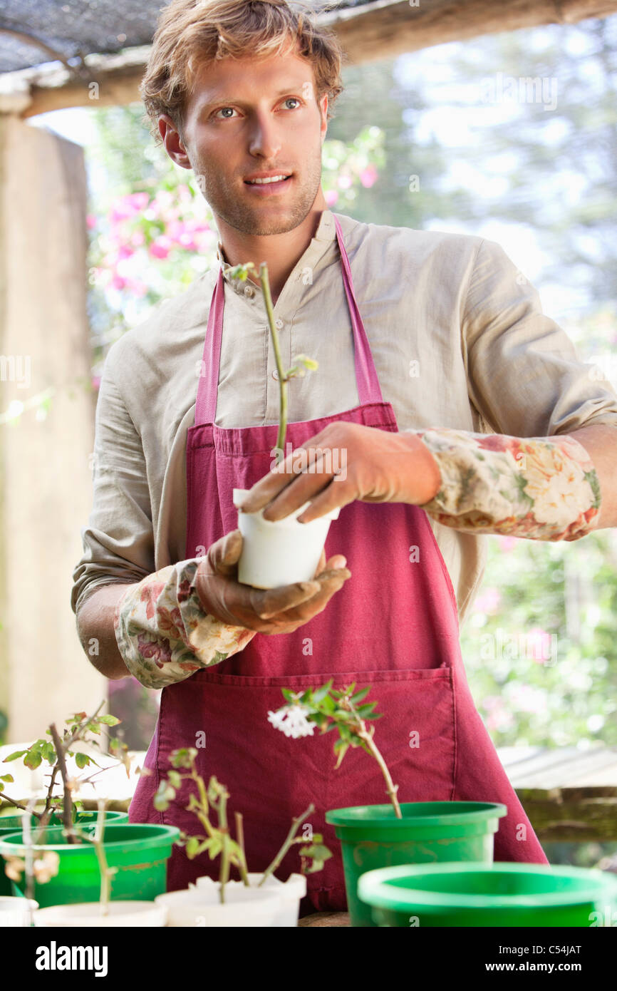 Man gardening and smiling Stock Photo - Alamy