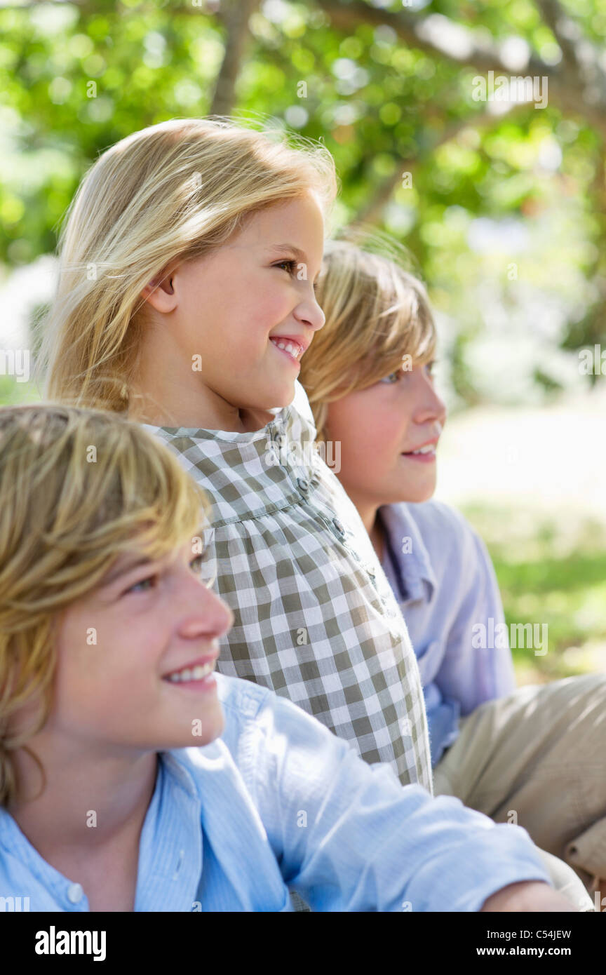 Side profile of cute little children looking away Stock Photo - Alamy