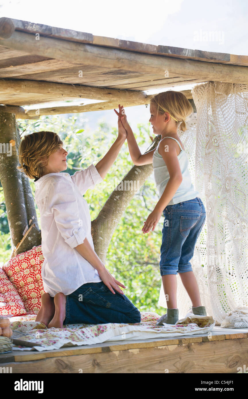 Girls high fiving hi-res stock photography and images - Alamy
