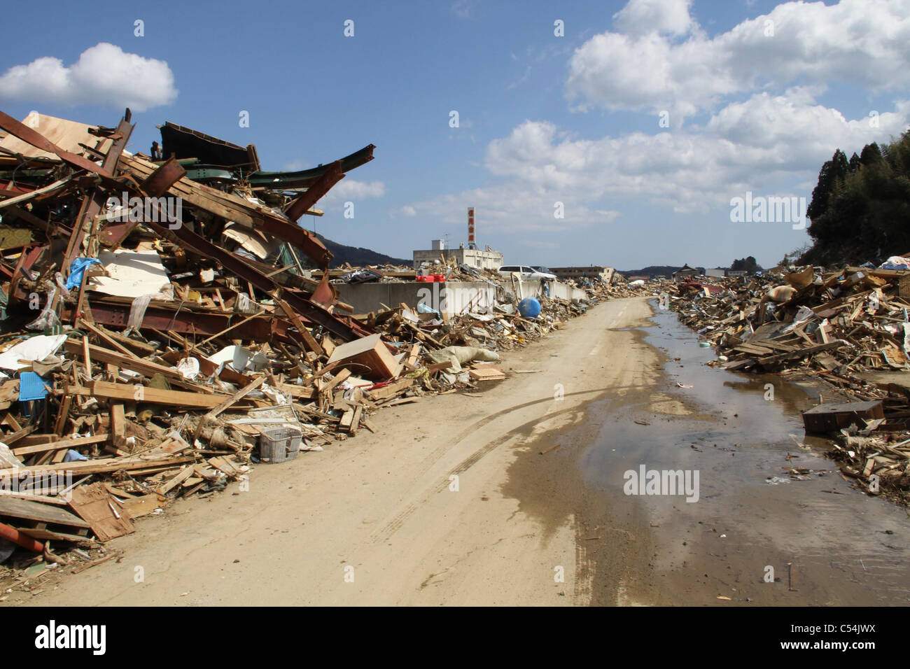 Two weeks after the tsunami, this port town struggles to recover. The ...