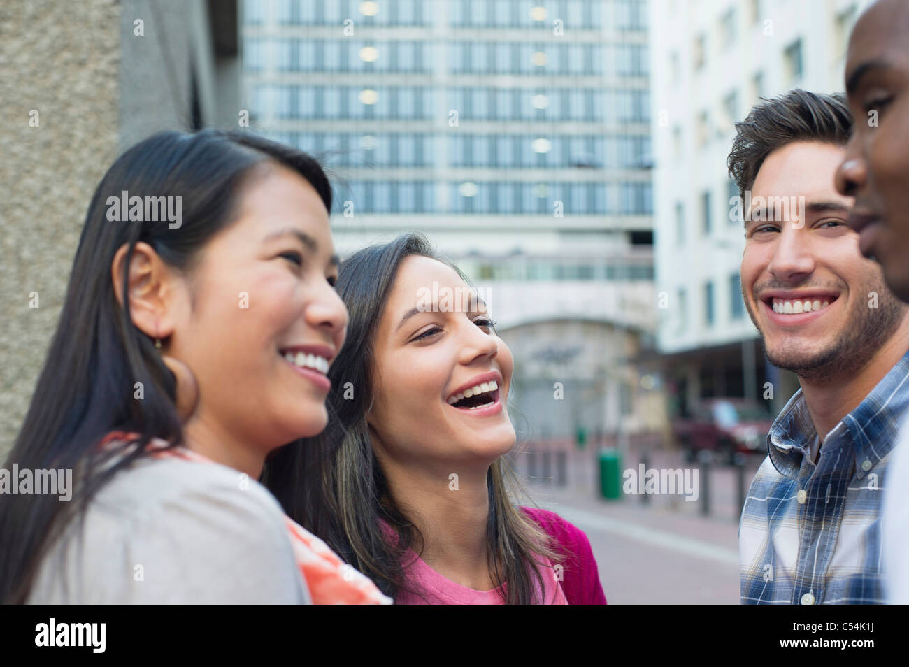 Close-up of friends standing together and smiling Stock Photo - Alamy