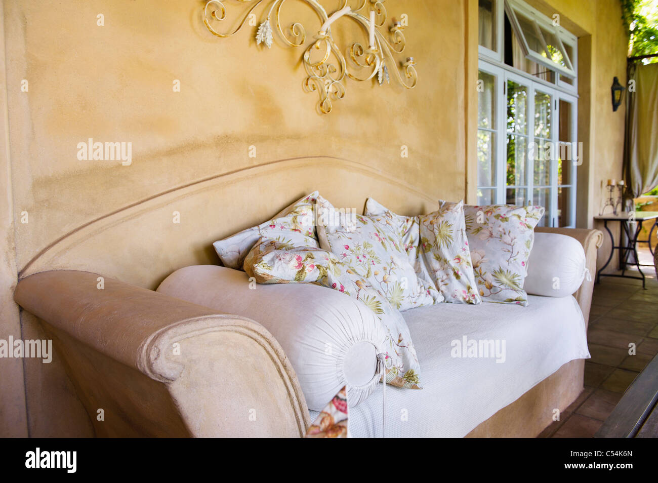 Couch in a veranda Stock Photo - Alamy