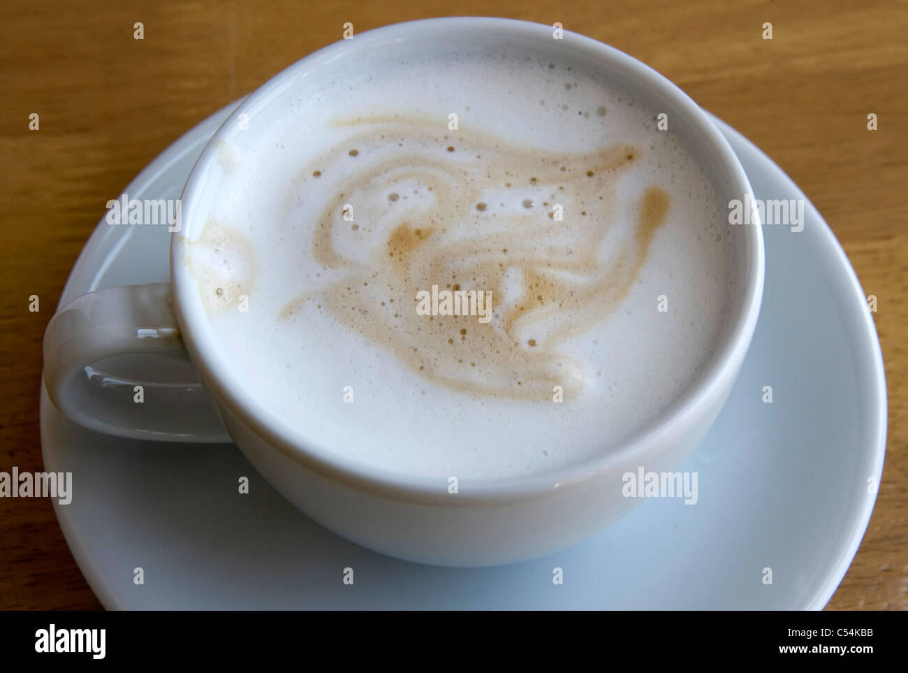 A cup of cappuccino coffee Stock Photo - Alamy