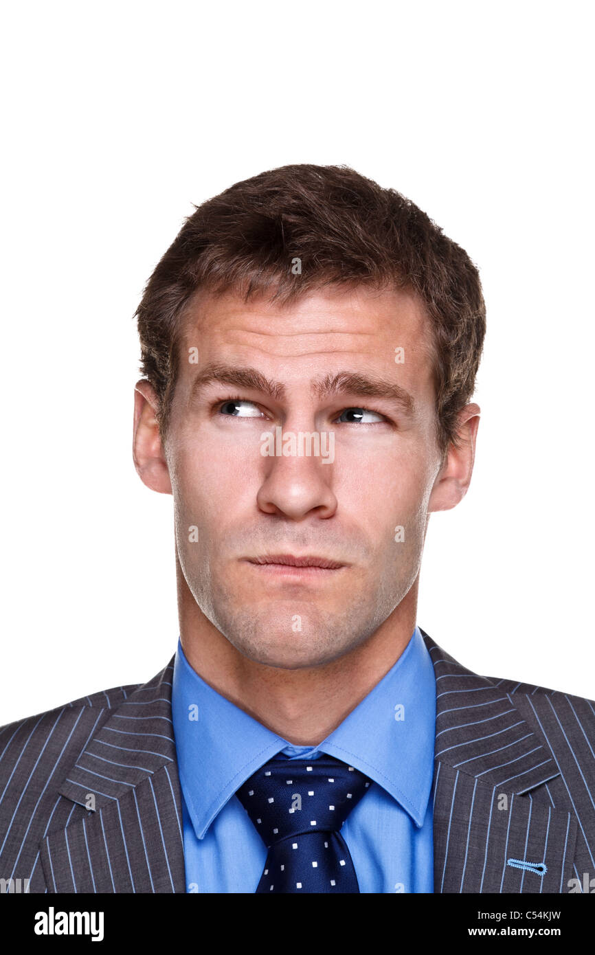 Photo of a businessman with a puzzled expression on his face, headshot ...