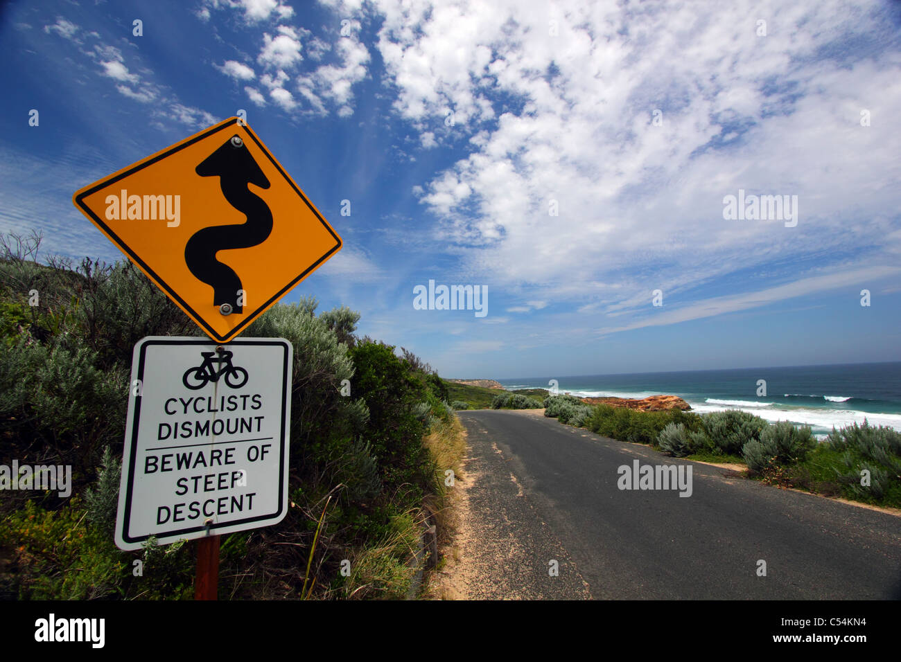 ROAD WARNING SIGN WOBBLY ARROW WARNING SKY BACKGROUND BDB Stock Photo ...