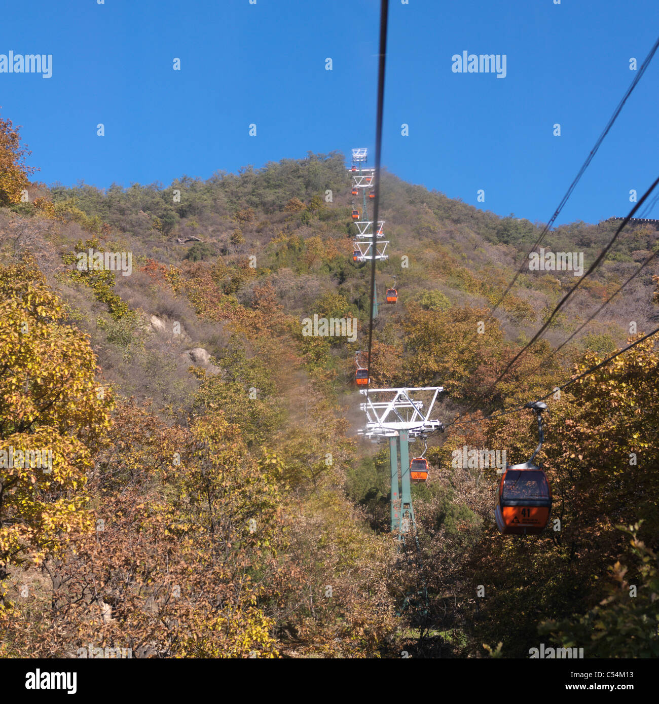 Overhead cable cars at the Mutianyu section of the Great Wall of China ...