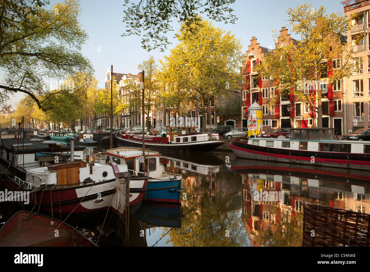 The Netherlands, Amsterdam, 17th century houses and houseboats at canal ...