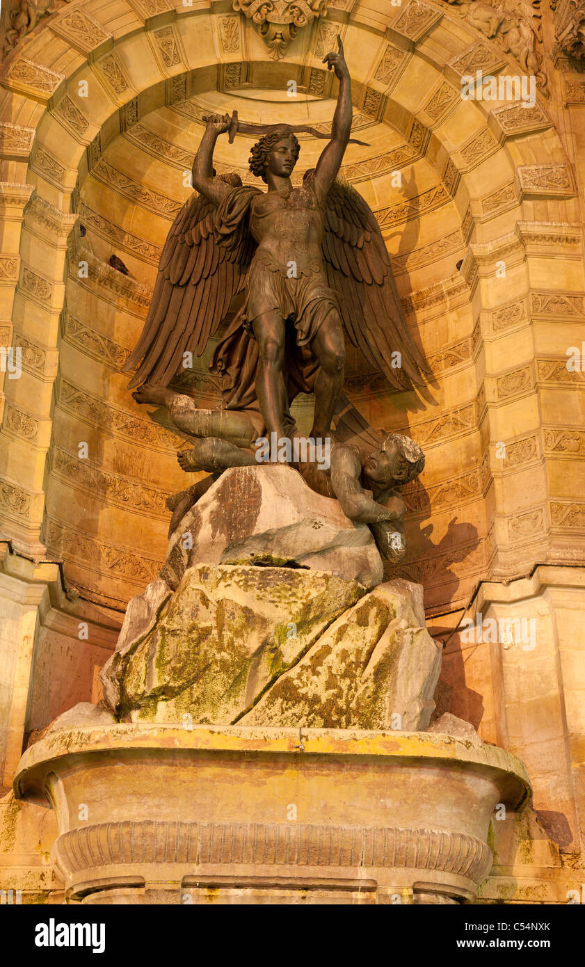 Paris - Saint Michael fountain in the night Stock Photo - Alamy