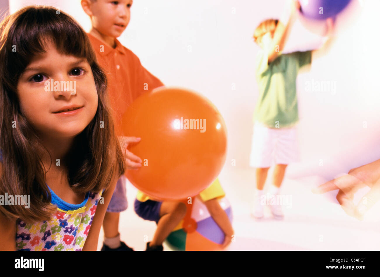 Children Bouncing Balls High Resolution Stock Photography and Images ...