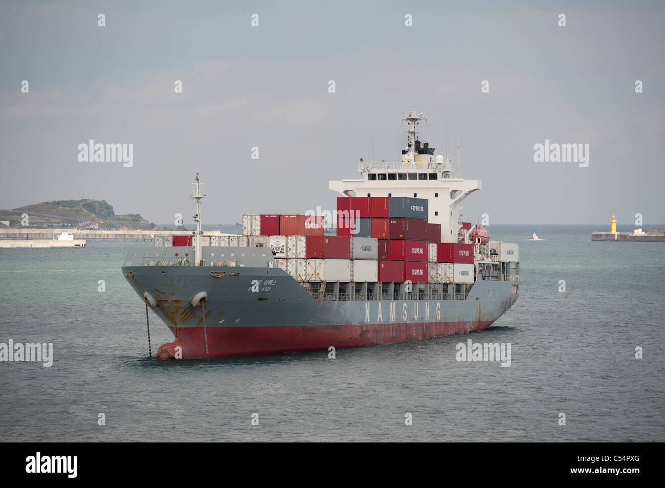 Container ship in the sea, Busan, Yeongnam, South Korea Stock Photo - Alamy
