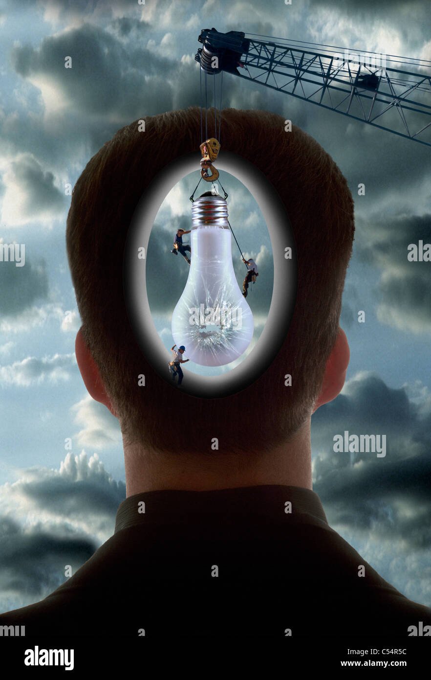 Broken bulb being replaced in the head of a man Stock Photo - Alamy