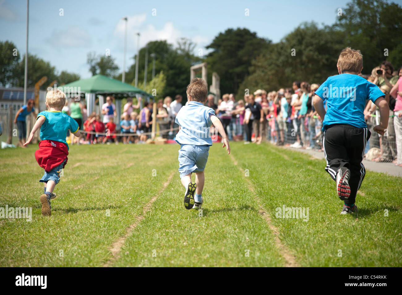 Young small boys racing at the annual School sports day at a small ...