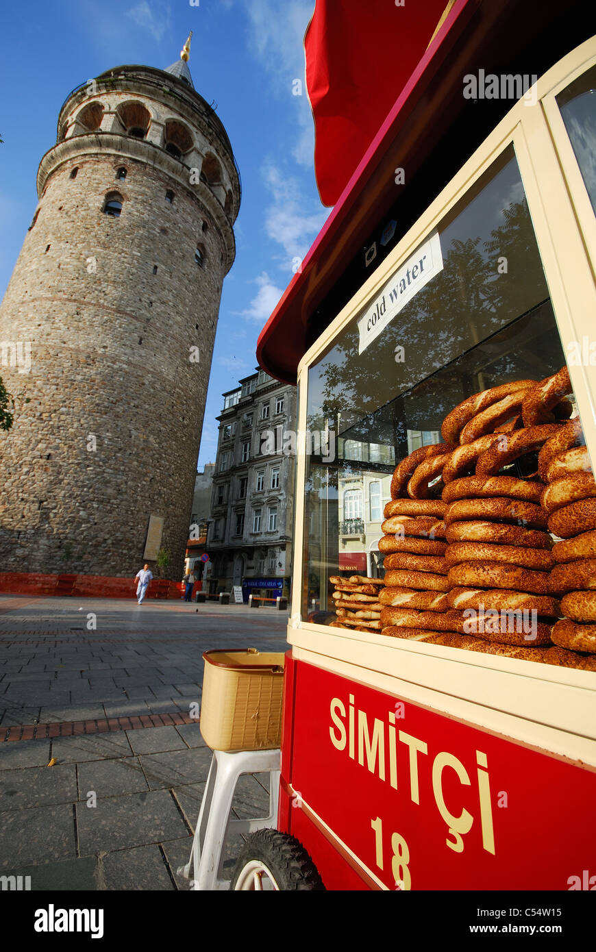 ISTANBUL, TURKEY. View of a simit cart by the Galata Tower in Beyoglu ...