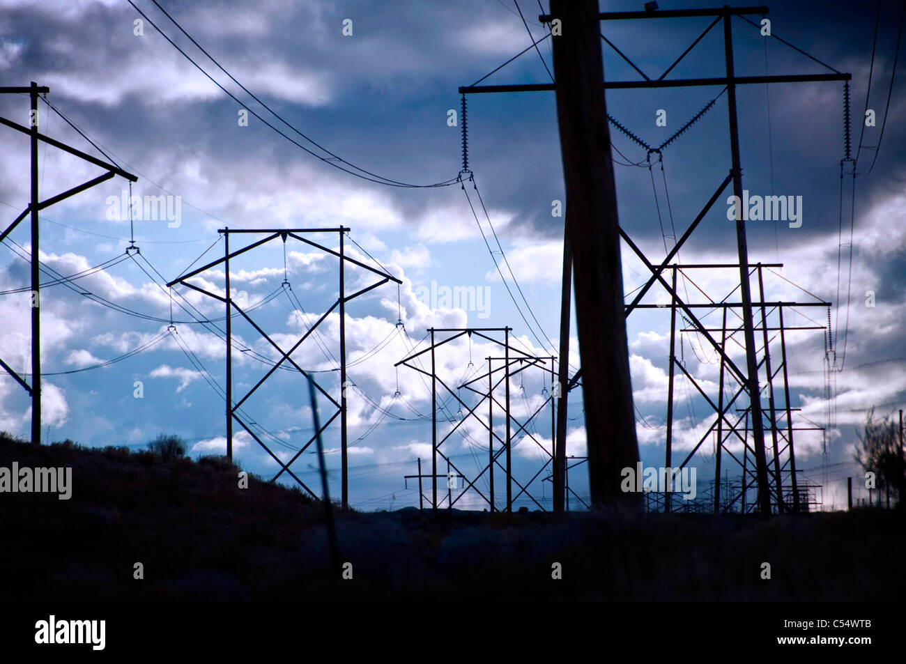 Electricity pylons at dusk, New Mexico, USA Stock Photo - Alamy