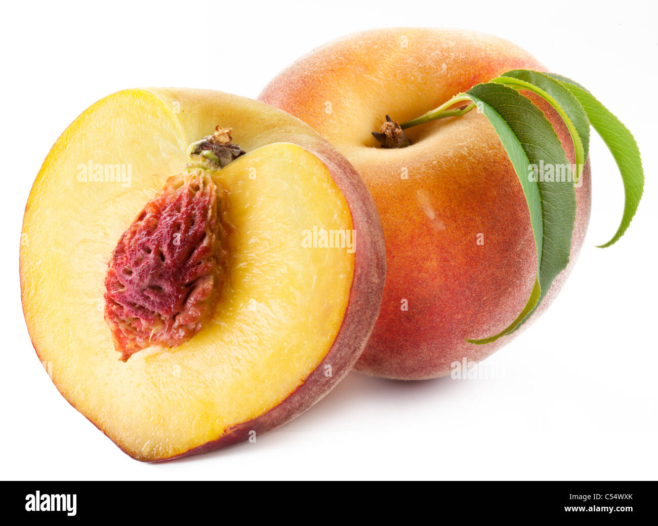 Ripe peach with leaves isolated on a white background Stock Photo - Alamy