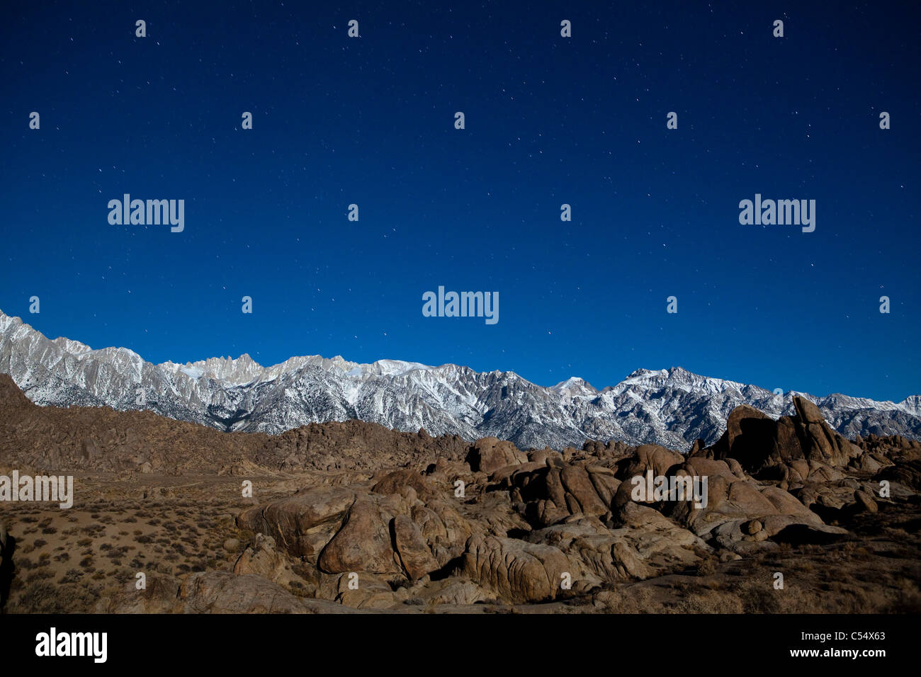 Low angle view of mountains in moonlight at night, Alabama Hills, Lone ...