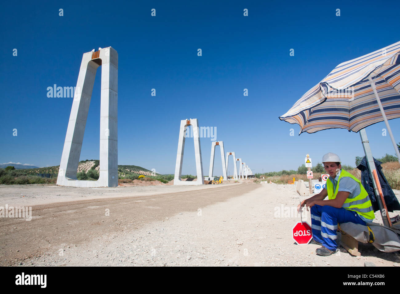 A worker at a high speed rail link construction site in Spain Stock ...