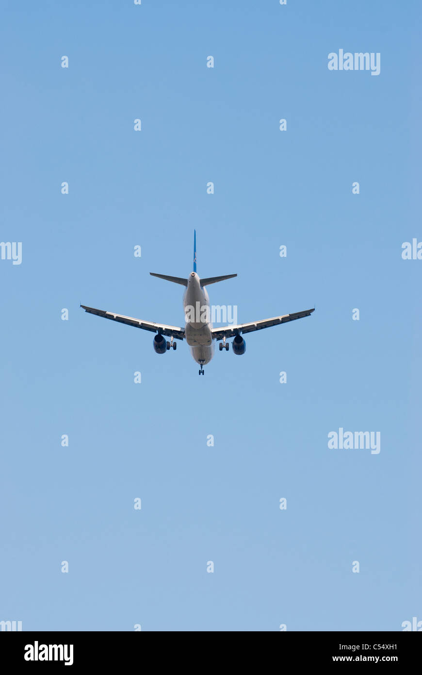 Single airplane on the blue sky background Stock Photo - Alamy