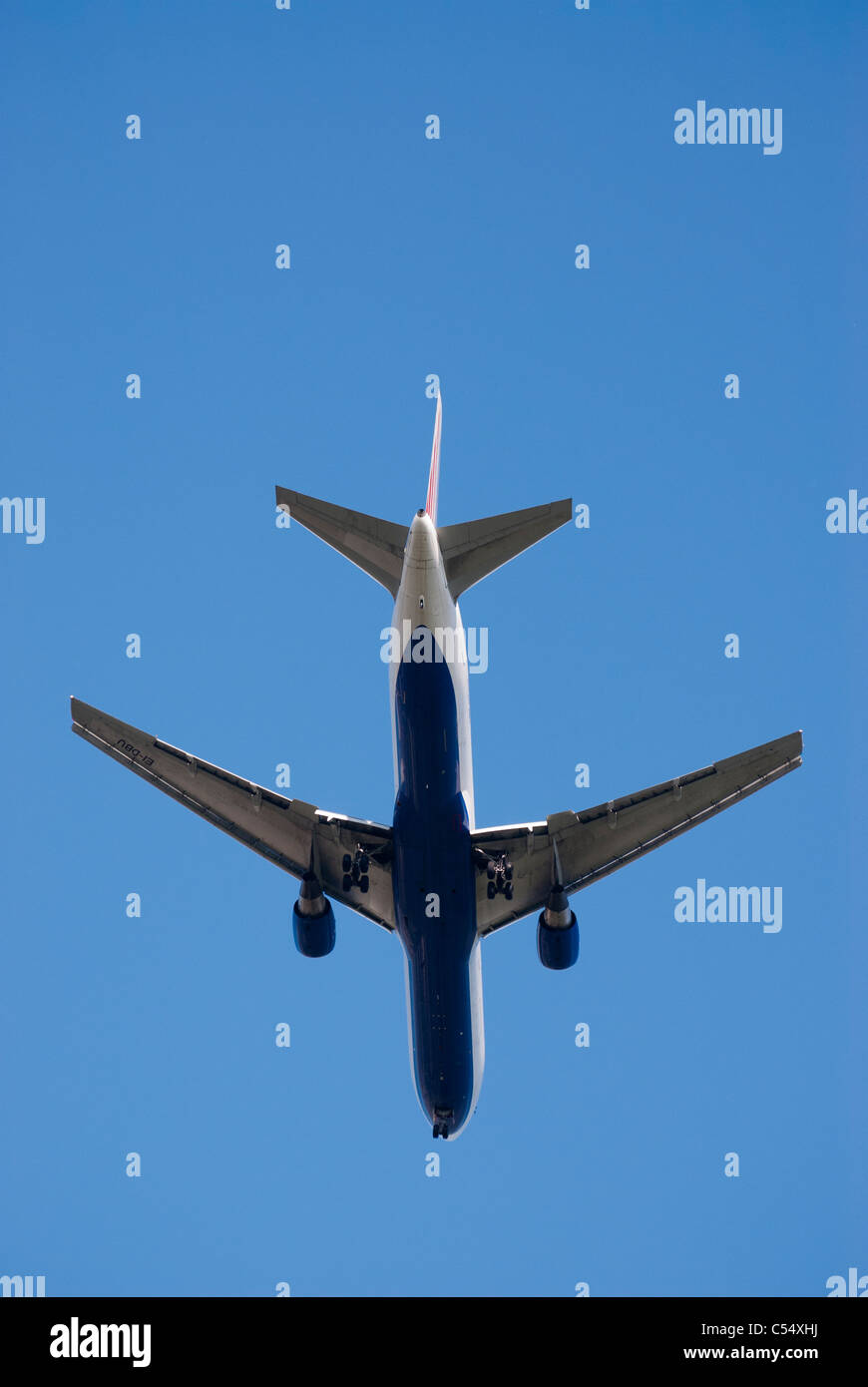 Single airplane on the blue sky background Stock Photo - Alamy