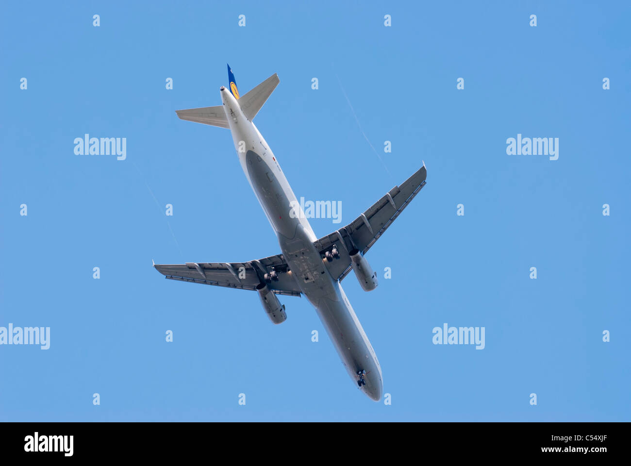 Single airplane on the blue sky background Stock Photo - Alamy