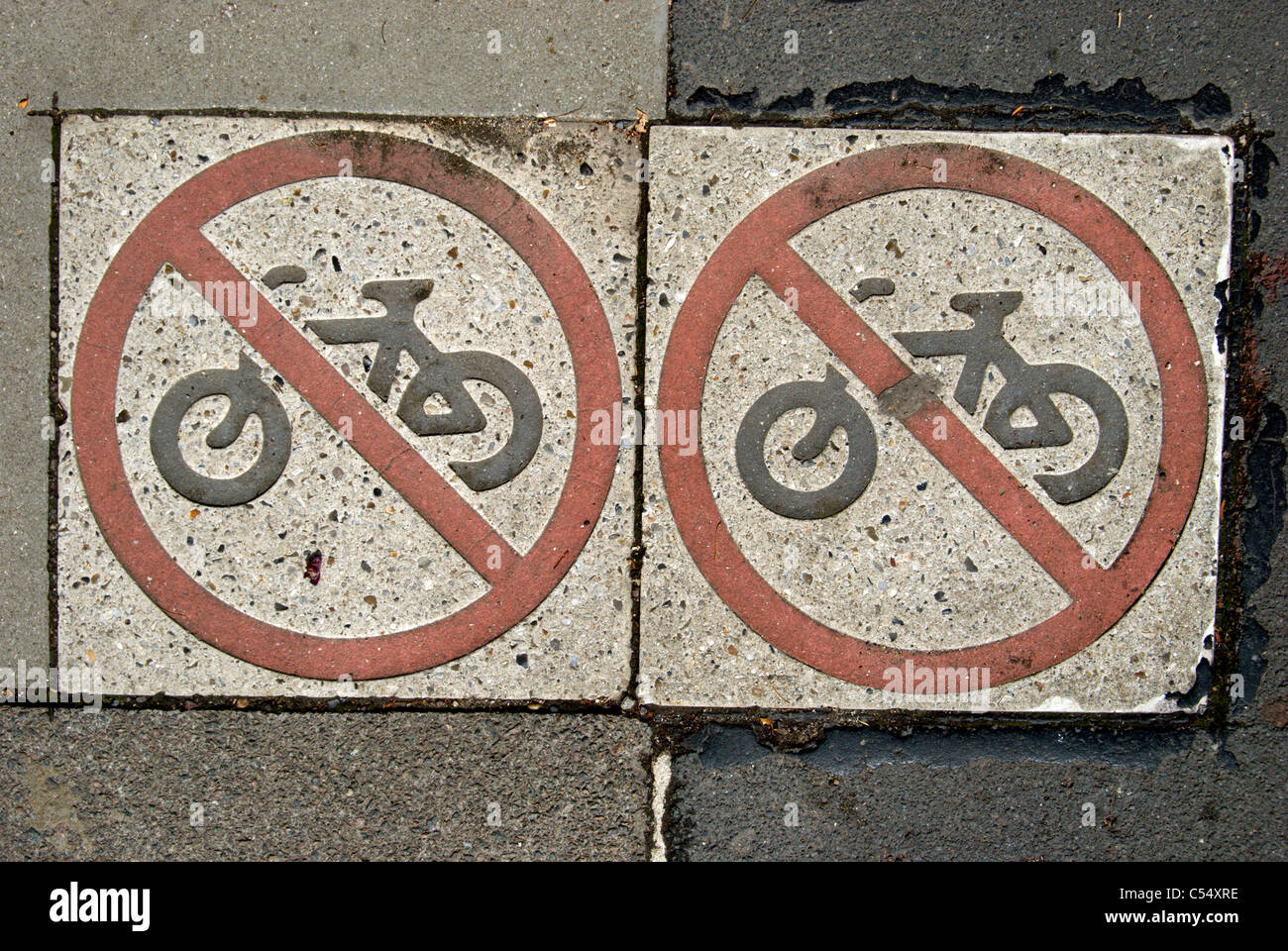 side by side no cycling markings on a pavement on richmond hill ...