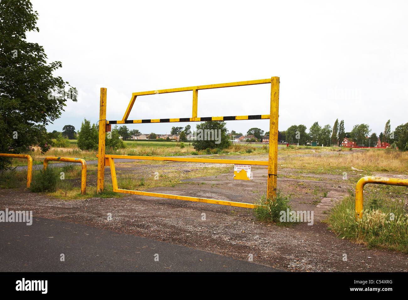 Yellow security gate Stock Photo - Alamy
