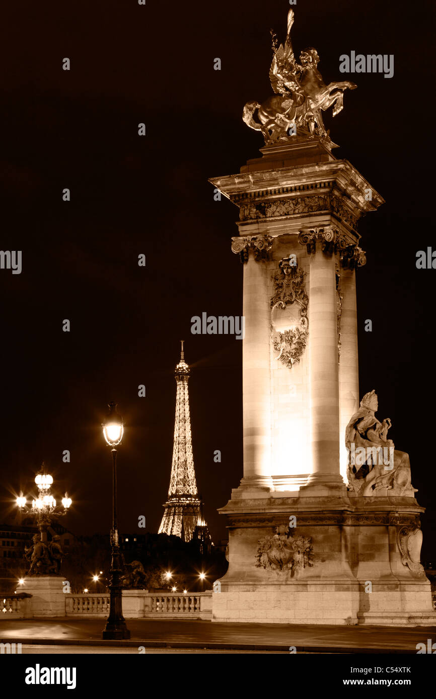 Rostral column bridge Alexander III at night, Paris, France Stock Photo ...