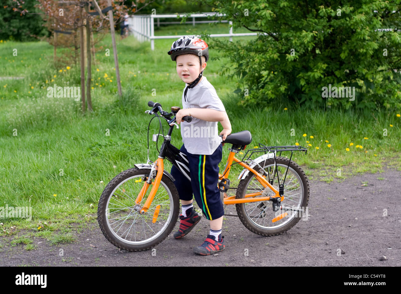 Boy on bicycle Stock Photo - Alamy