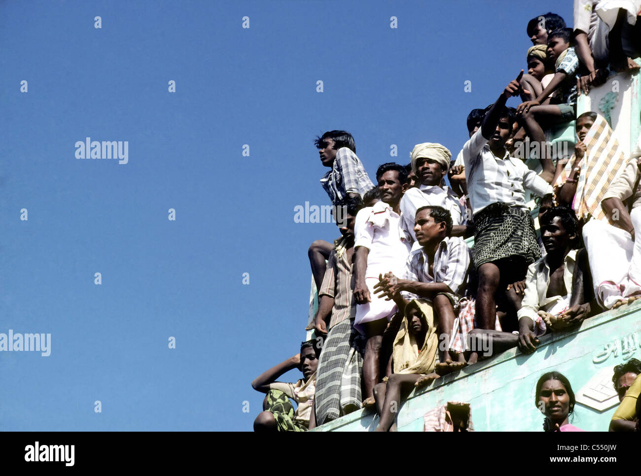 India, Tamil Nadu State, Madurai, Spectators watching Jallikattu at ...