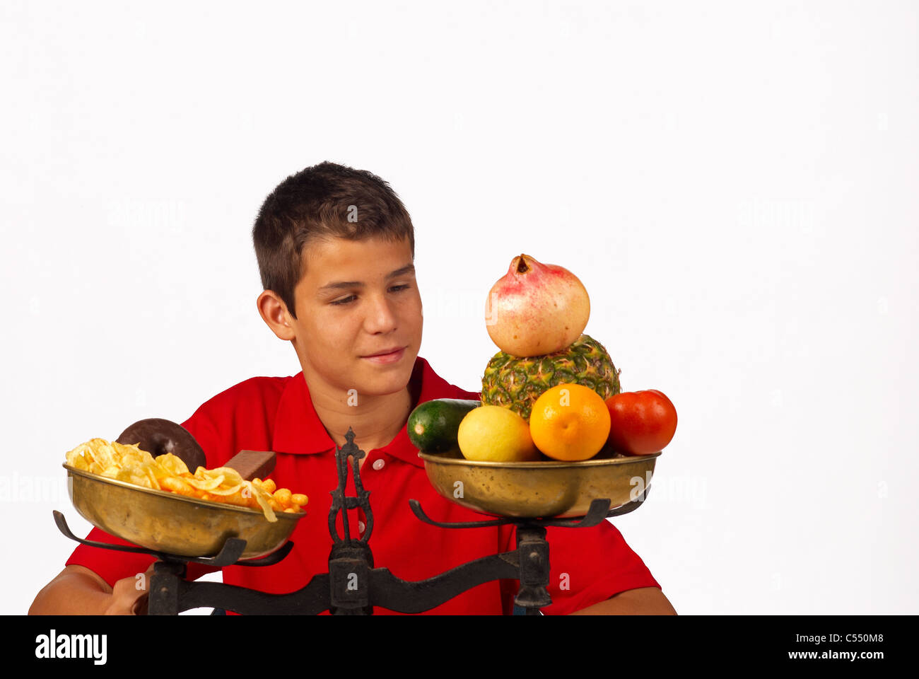 Nutrition balance, educated teenager choosing the healthy option Stock ...