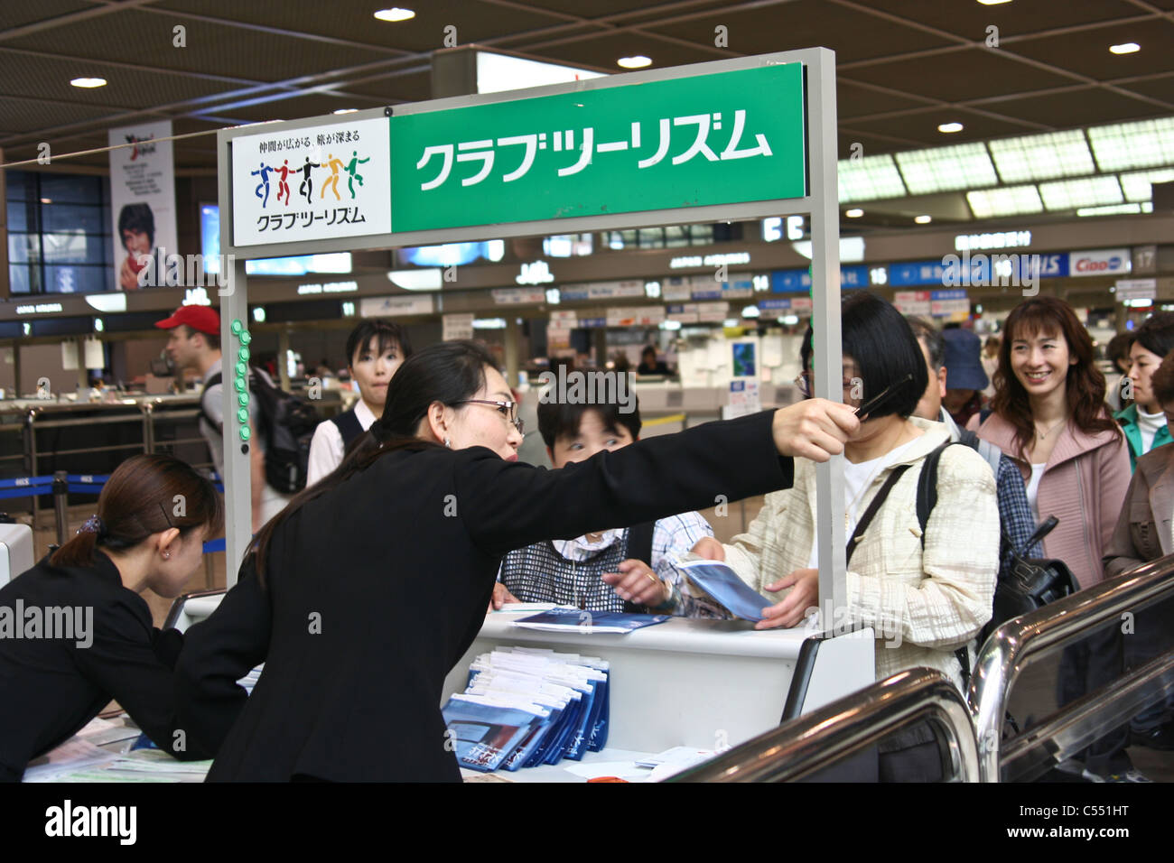 Narita airport Japan check in desk passengers Stock Photo - Alamy