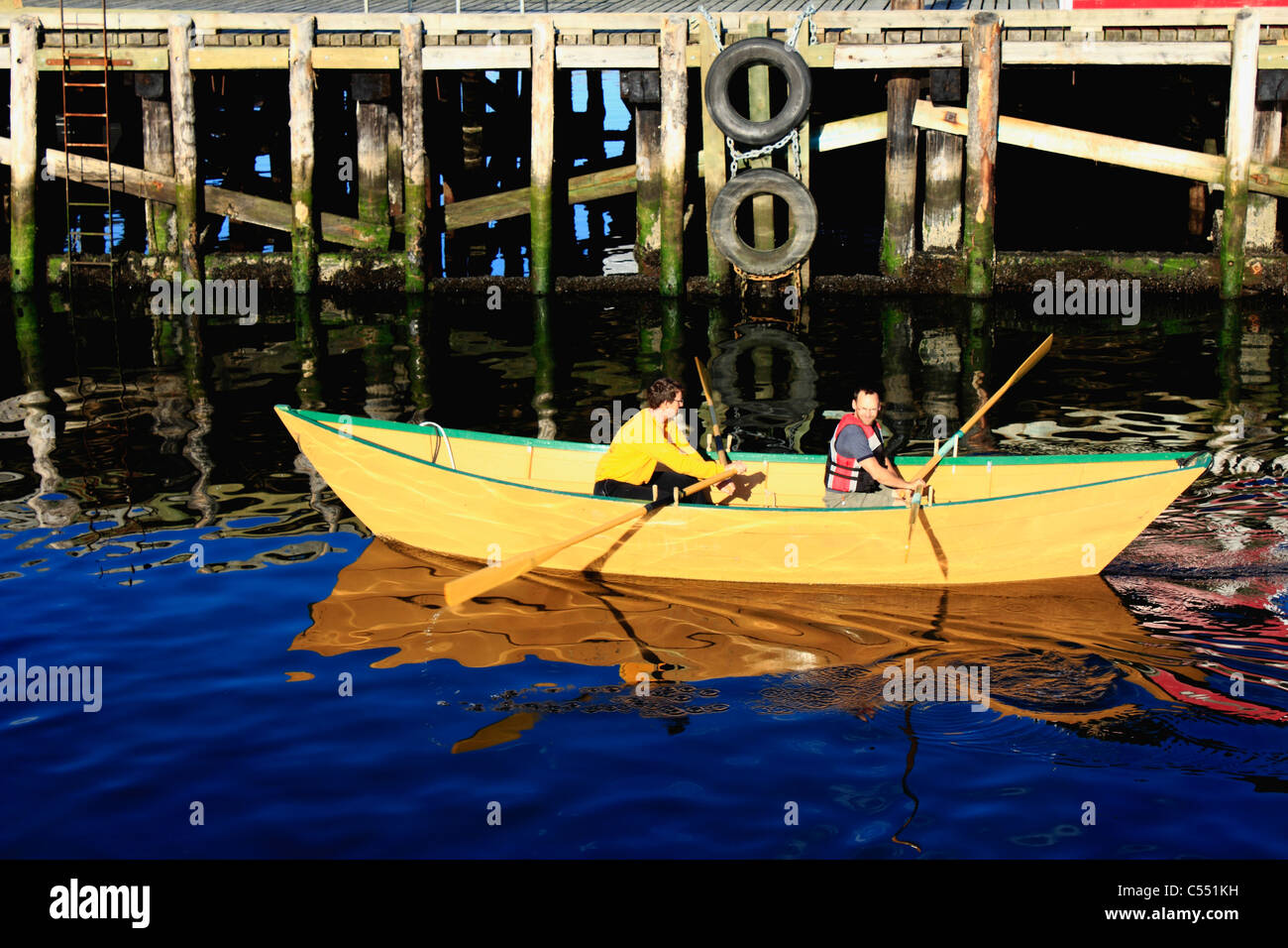 Two men rowing a boat hi-res stock photography and images - Alamy