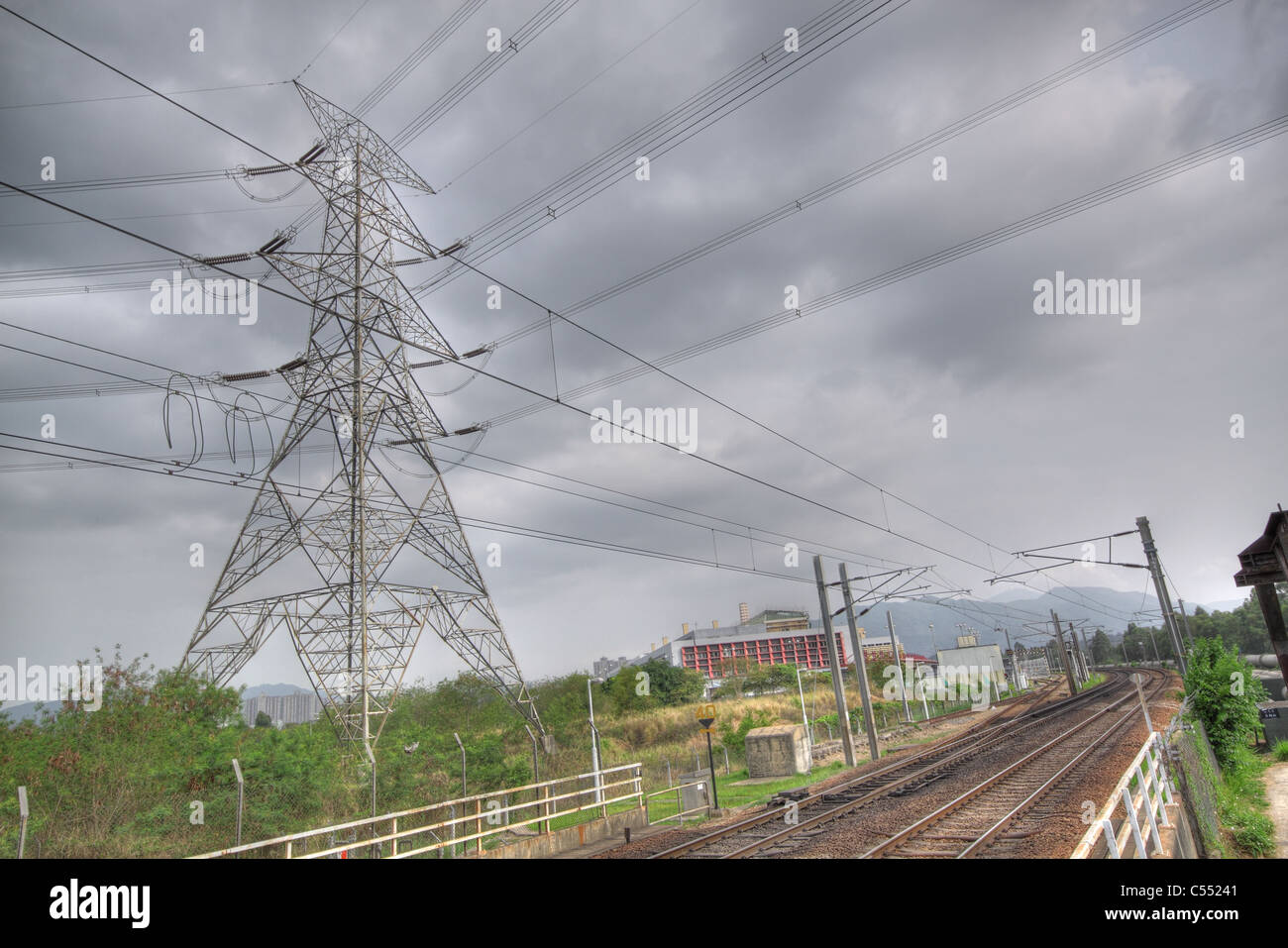 train track and power tower Stock Photo - Alamy