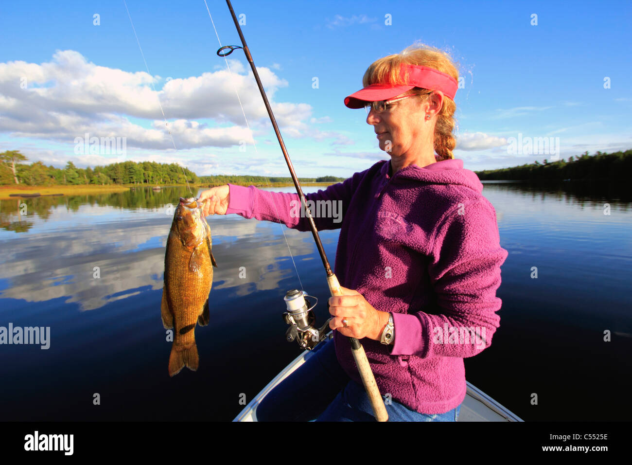 Woman bass fishing hi-res stock photography and images - Alamy