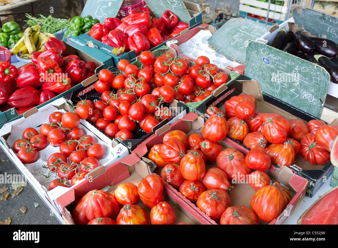 Assorted red vegetables on a French market Stock Photo - Alamy
