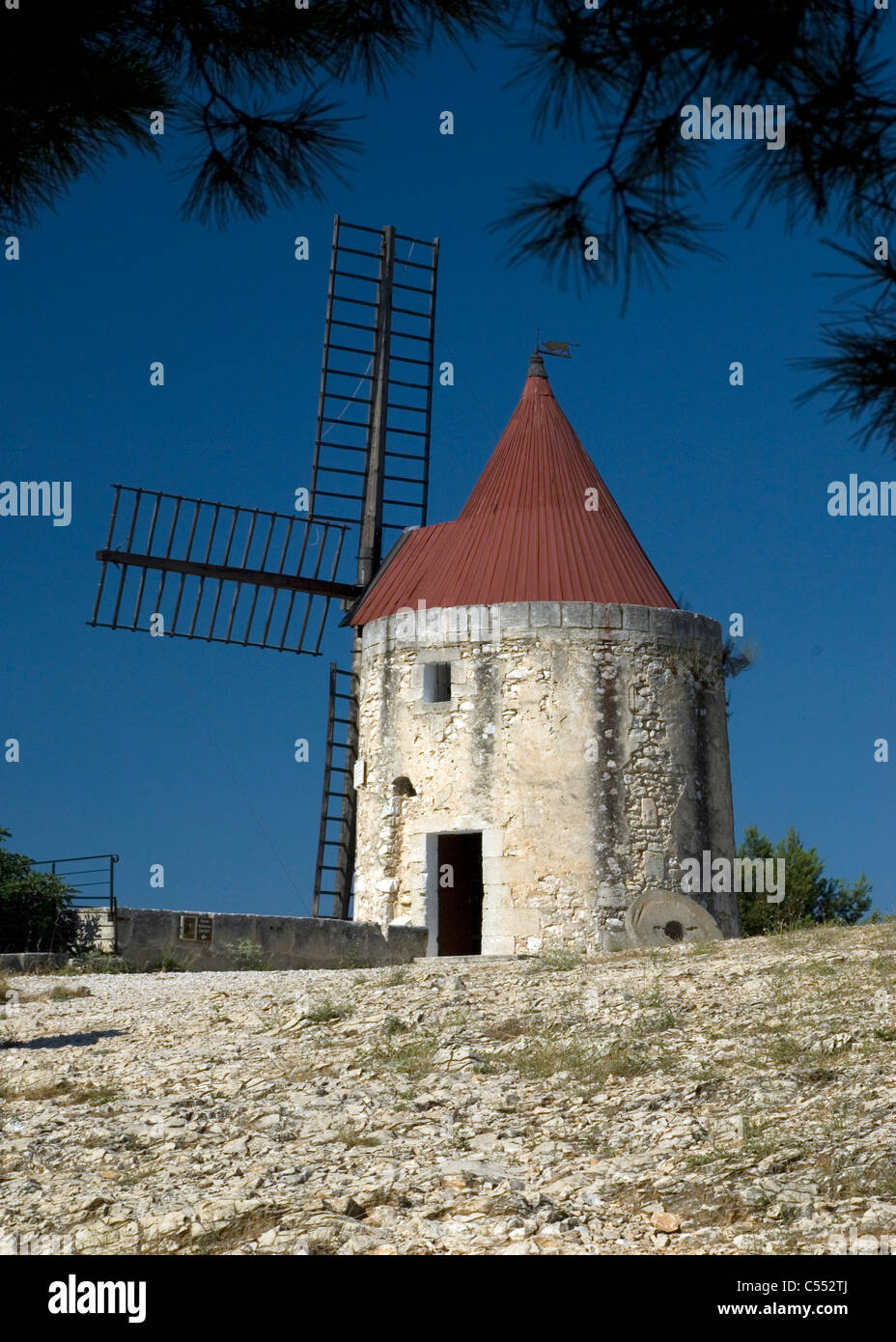 Traditional windmill on a landscape, Moulin De Daudet, Fontvieille ...