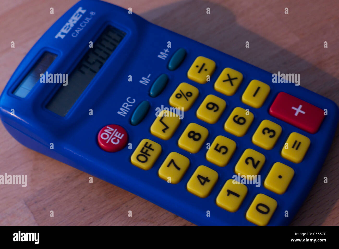 Blue plastic calulator Stock Photo - Alamy