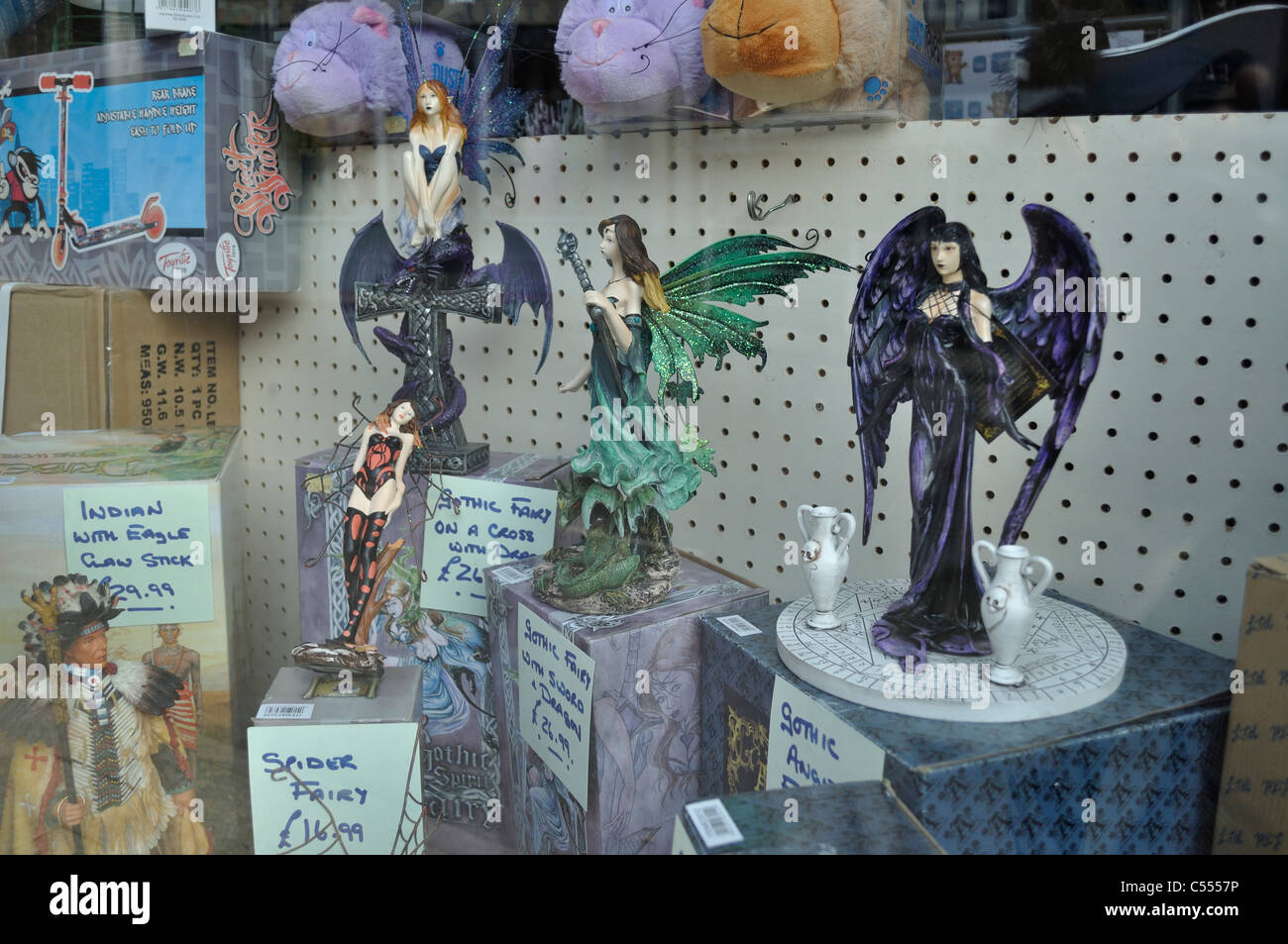 Gothic figurines on display in a shop window in Castle Cary, Somerset ...