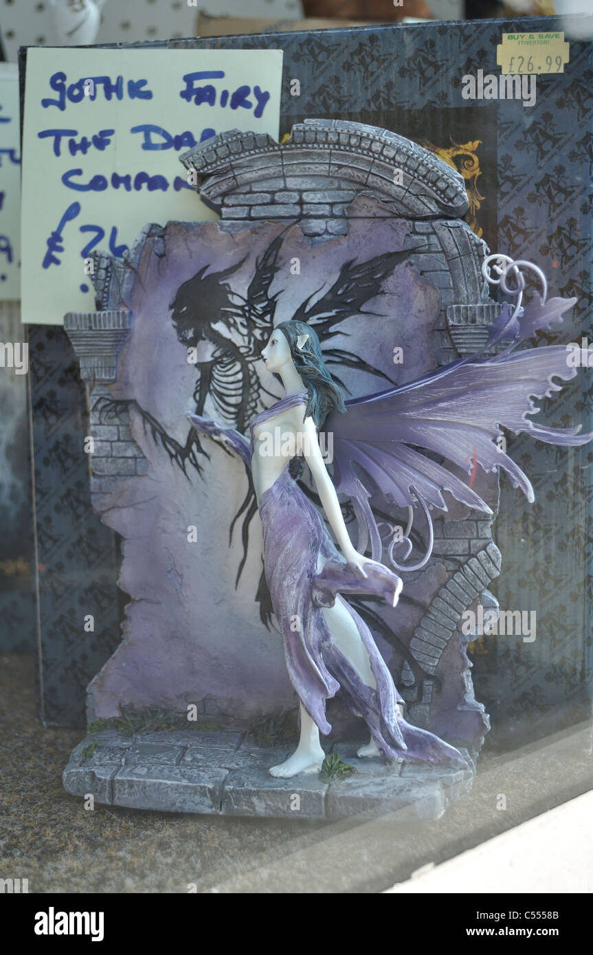 A gothic figurine on display in a shop window in Castle Cary, Somerset ...
