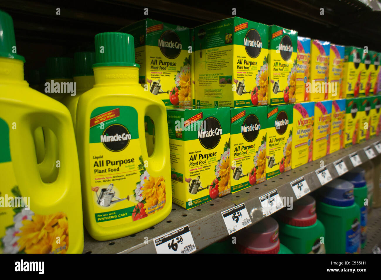 Bottles and packages of Miracle Grow garden fertilizer are seen on a ...