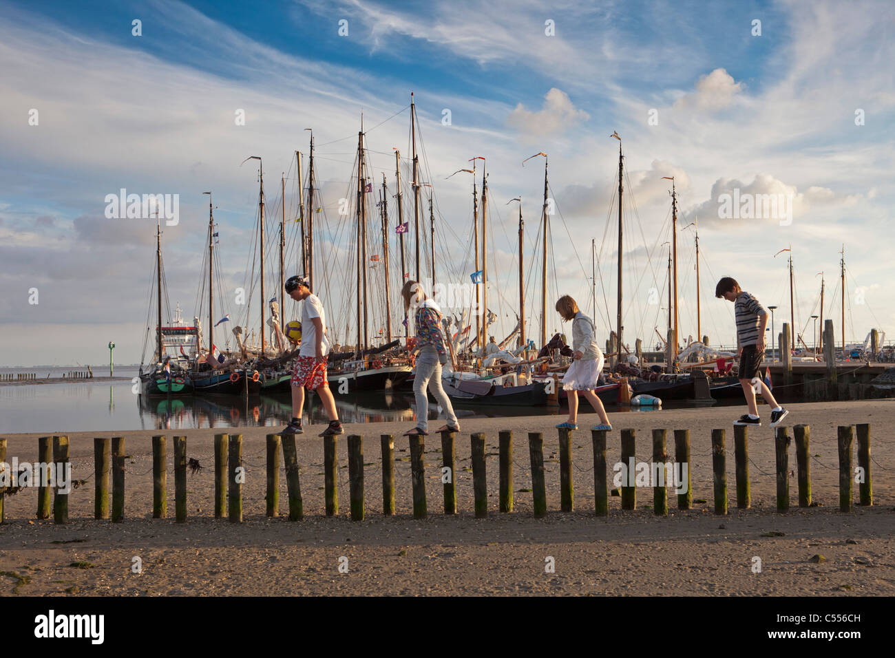 Holland, Nes, Ameland Island,Wadden Sea Islands. Sailing boats on mud ...