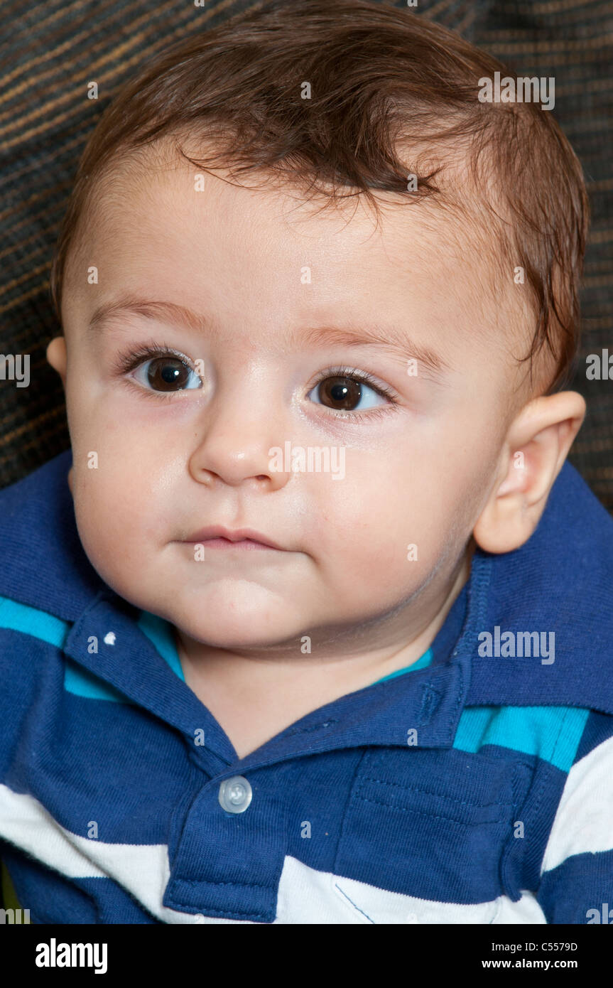 Cute little boy looking away Stock Photo - Alamy