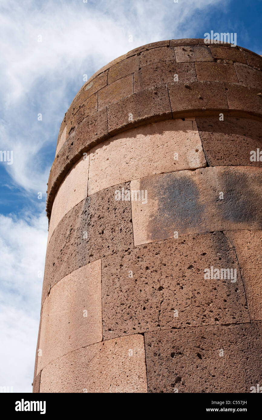 One of the funerary towers at Silustani close to Puno in Peru. The ...
