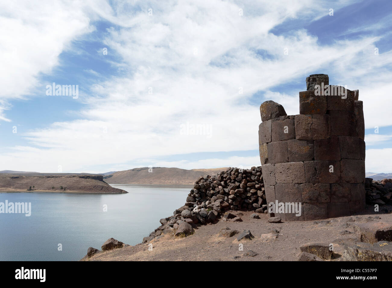 One of the funerary towers at Silustani close to Puno in Peru. The ...