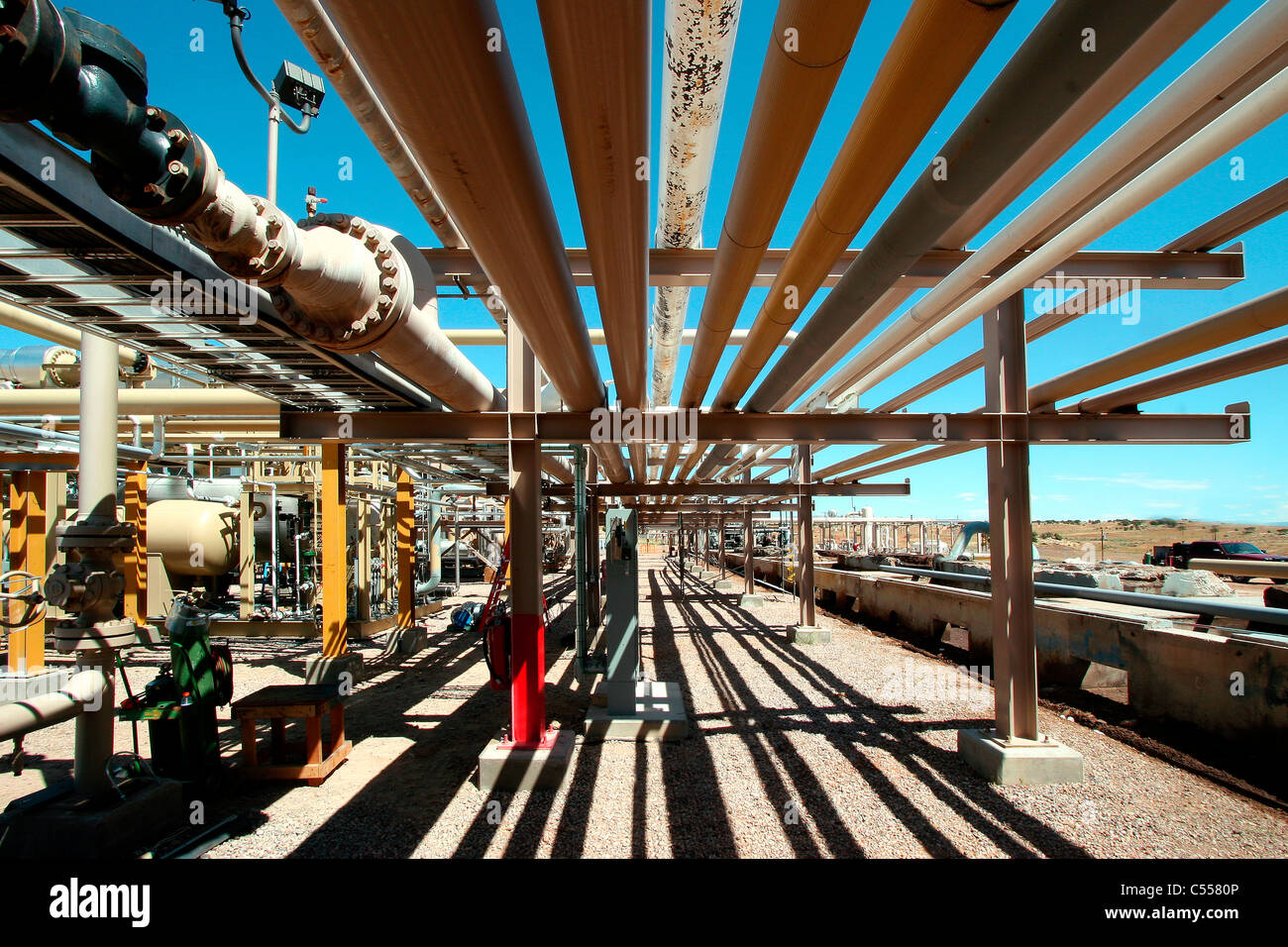 Pipe work of a natural gas plant Stock Photo - Alamy