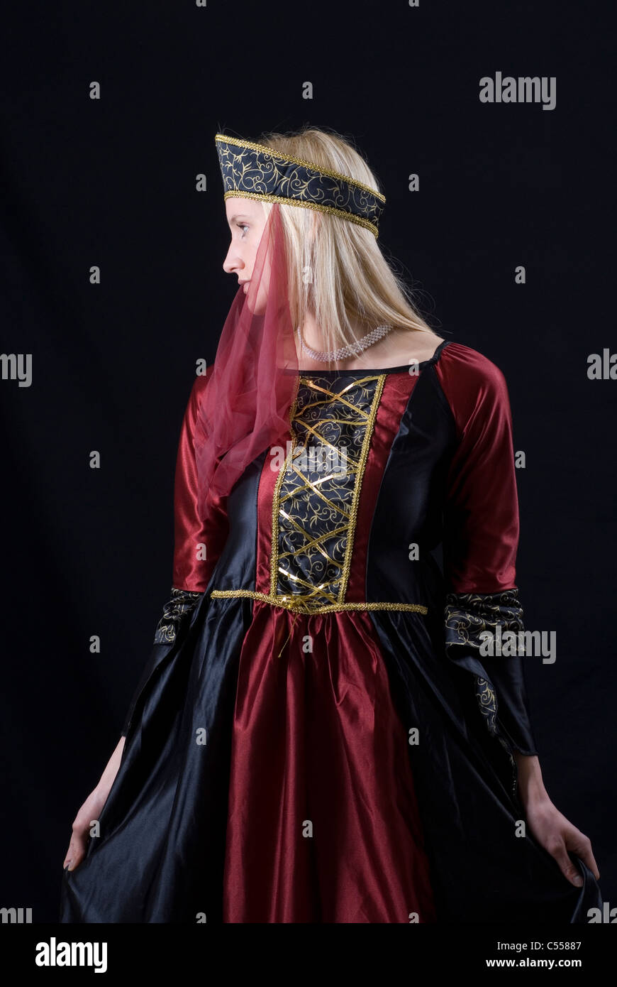 medieval woman looking over shoulder Stock Photo - Alamy