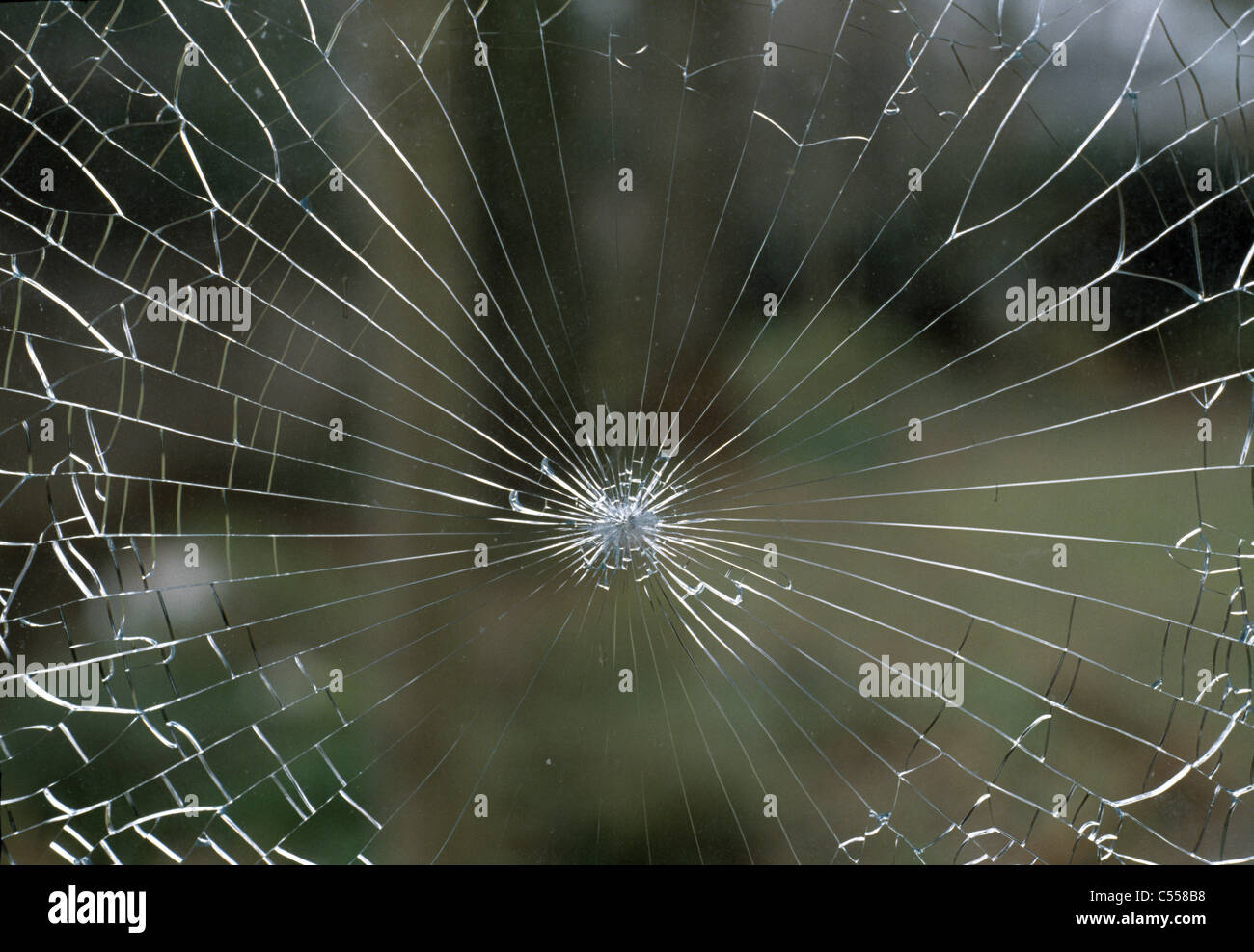 Close-up of a pattern on broken glass Stock Photo - Alamy