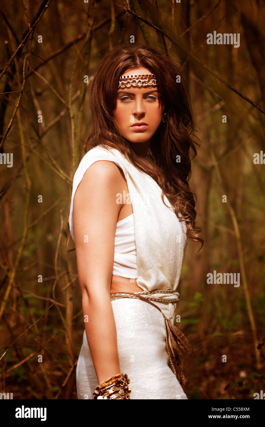 Veautiful Greek woman walking in the forest Stock Photo - Alamy