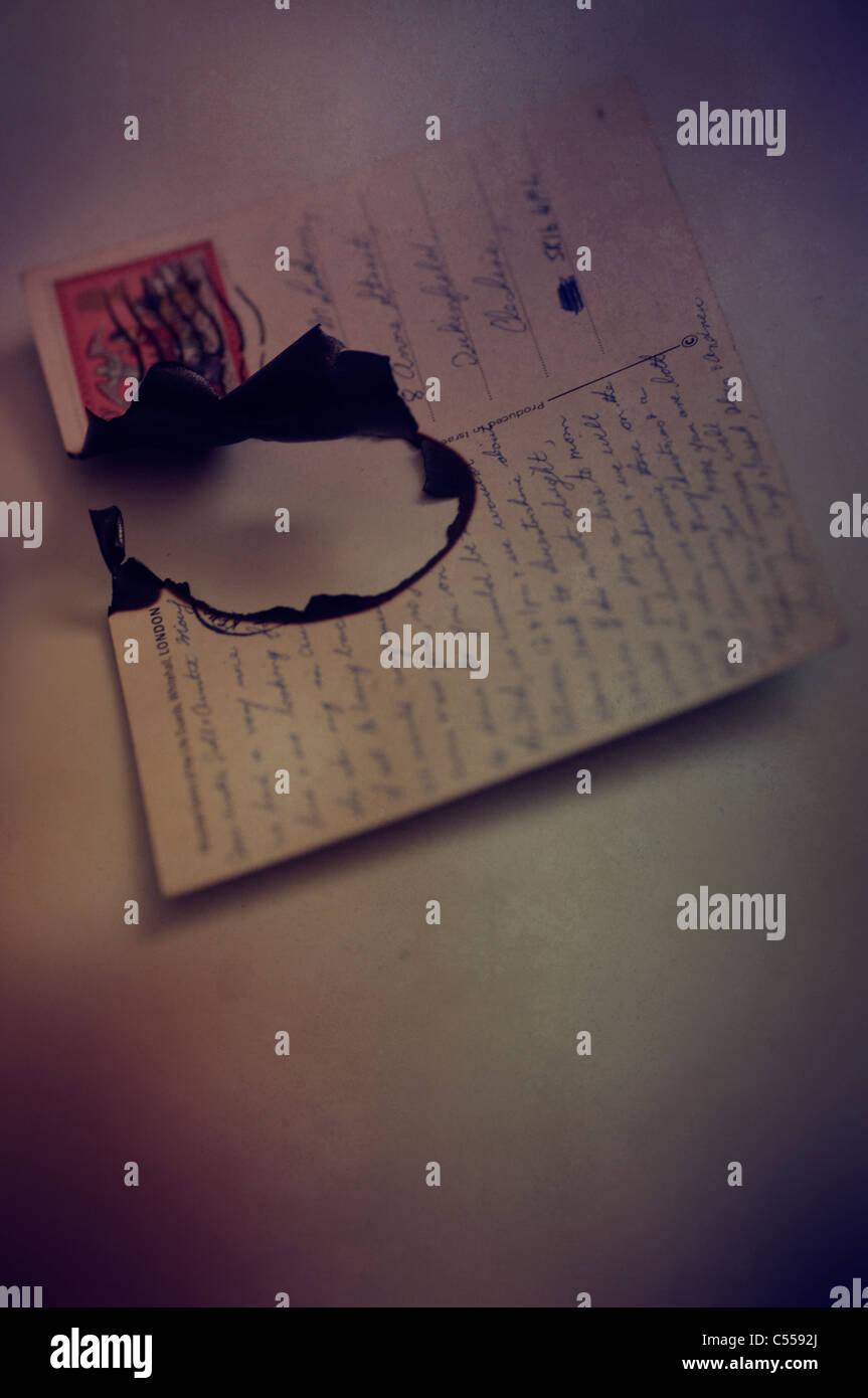 burnt old postcard Stock Photo - Alamy